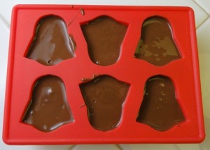 Tap the mold several times until air bubbles come to the surface.